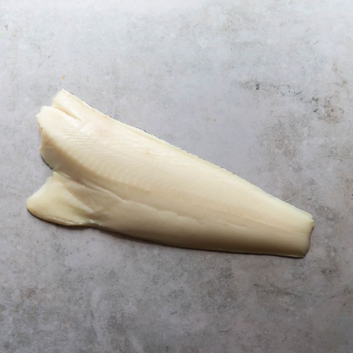 Head off, tail less, gutted WILD Chilean seabass skin-on (toothfish ...